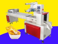 China milk jujube Sugar Pillow Flowing candy cake flow packing machine for sale