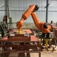 China FullyAutomatic KUKAKR300 R2700-2 6Axis RoboticArm Brick Palletizing Application with Metal Suction Cup for Construction Industry for sale
