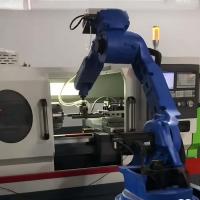 China Yaskawa Motoman-Gp25 Industrial Robot 25kg 1730mm with Customized Gripper and Safety Fence for CNC Machine Loading Unloading for sale
