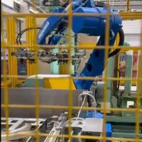 China Yaskawa Motoman-Gp25 Industrial Robot 25kg 1730mm with Customized Gripper and Safety Fence for CNC Machine Loading Unloading for sale