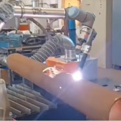 China UR7E Screw Driving Robot Collaborative Robot Plasma Cutting Payload 12kg Arm Reach for sale