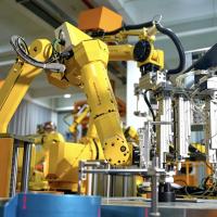 China FANUC M-710iC/70 6 Axis Robot for Water Pump Assembly with Vision Positioning High Speed Handling and One Click Line Changeover for sale