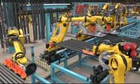 China Heavy Load 4-Axis Industrial Robot Fanuc M-410IC/315 Robot 315kg 3143mm with Magnetic Gripper Handling Steel Structure for sale