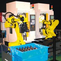 China Fanuc M-710iC/50 Industrial Robot 50kg 2050mm Inverted Gantry Truss for Machine Tending with Customized Gripper for sale
