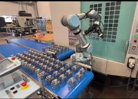 China Universal Robot UR 16e CNC Machine Tending Material Handling with Onrobot Gripper AGV Navigation Cobot Workstation for sale