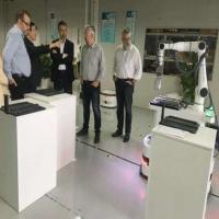 China Cobot 6 Axis Elfin E10-L China Robot Combine With AGV  and Robotiq Gripper 2F-85 As Mobile Cobot for sale