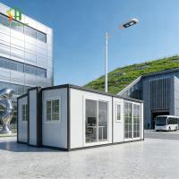 China 30FT Expandable Container House 56sqm Dual Wing Fold-Out Steel Frame Prefab Home Unit for sale