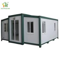 China Double Wing Fold Out Expandable Shipping Container Home 20ft 30ft 40ft for sale