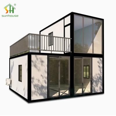 China Easy Relocation Double Wing Expansion House Fold Out Container Home Expandable for sale