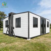 China 700 Mini Double Wing Expandable Container House Mobile Prefab Office & Living Unit for sale