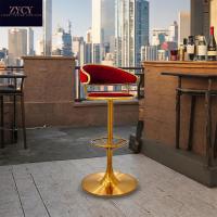China Red Velvet Swivel Bar Stool Luxury Bar Furniture Gold Metal Height Adjustable Footrest Fabric for sale