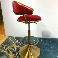 China Red Velvet Swivel Bar Stool Luxury Bar Furniture Gold Metal Height Adjustable Footrest Fabric for sale