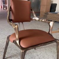 China Retro Leather Dining Chair Luxury Dining Room Furniture Modern French Fabric Seat Pure Copper Frame for sale