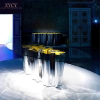 China Designer Wave Shaped Tempered Glass Dining Table Luxury Dining Room Furniture Villa Art Flower Elliptical for sale