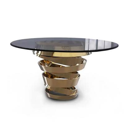 China Stainless Steel Round Table Luxury Dining Room Furniture Tempered Glass Modern Creative Art for sale