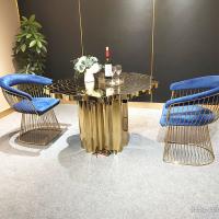 China Stainless Steel Electroplated Mirror Round Table Luxury Dining Room Furniture Luxurious Engraved Decor for Home for sale