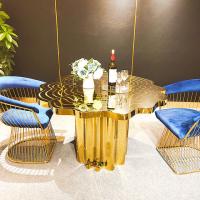 China Stainless Steel Electroplated Mirror Round Table Luxury Dining Room Furniture Luxurious Engraved Decor for Home for sale