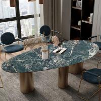 China Italian Natural Marble Drop Shaped Dining Table Luxury Dining Room Furniture High End Stainless Steel for sale
