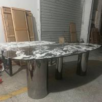 China Italian Natural Marble Drop Shaped Dining Table Luxury Dining Room Furniture High End Stainless Steel for sale