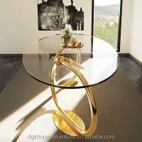 China Tempered Glass Oval Dining Table Set Luxury Dining Room Furniture Italian High Grade Metal Modern for sale