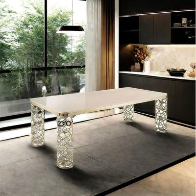 China Modern Square Dining Table Set Luxury Dining Room Furniture Natural Cave Stone Surface Stainless Legs for sale