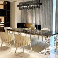 China Modern Square Dining Table Set Luxury Dining Room Furniture Natural Cave Stone Surface Stainless Legs for sale