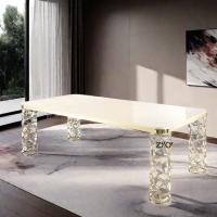 China Modern Square Dining Table Set Luxury Dining Room Furniture Natural Cave Stone Surface Stainless Legs for sale