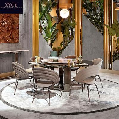 China Glass Round Dining Table Set Marble Rotating Surface Leather Upholstered Stainless Steel Chairs for Home for sale