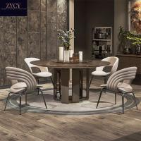 China Glass Round Dining Table Set Marble Rotating Surface Leather Upholstered Stainless Steel Chairs for Home for sale