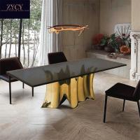 China Art Glass Dining Table Italian High End Modern Luxury Designer Style Stainless Steel for sale