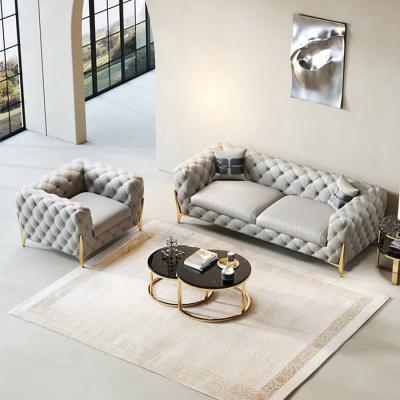 China Italian Leather Button Down Three Seater Sofa Luxury Living Room Furniture Stainless Steel Base for sale