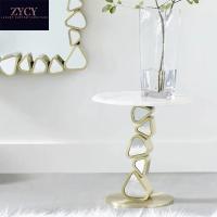 China Sophisticated Marble Side Table Luxury Living Room Furniture Creative Small Round Corner Table for sale