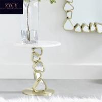 China Sophisticated Marble Side Table Luxury Living Room Furniture Creative Small Round Corner Table for sale