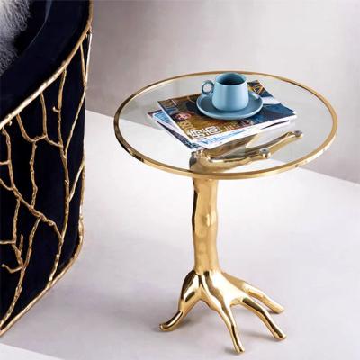 China Movable FRP Coffee Table Tempered Glass Top Metal Frame Palm Leaf Design for sale