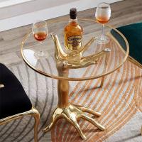 China Movable FRP Coffee Table Tempered Glass Top Metal Frame Palm Leaf Design for sale