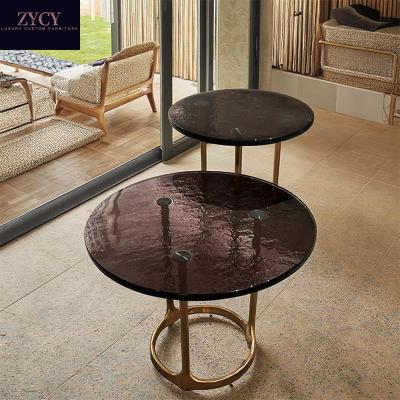 China Italian Designer Modern Round Coffee Table Brass Acrylic Metal Material for sale