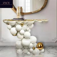 China Foam Styling Console Table Modern Luxury Villa High Performance Black White Gold Bubble for sale