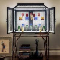 China Tempered Glass Wine Cabinet Creative Stainless Steel Sideboard High Legged Storage for sale