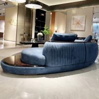 China Curved Sofa Set Multi Person Solid Wood Fabric Sponge Filled Coffee Table for sale