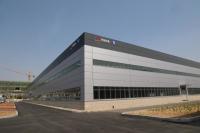 China Customizable Steel Structure Building 50m Clear Span Industrial Workshop Warehouse for sale
