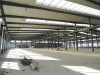 China Prefabricated Steel Frame Building Q355 Q235 Steel Structure House for Industrial Use for sale