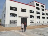 China Lightweight Industrial Steel Building Q235 Q355B Portal Frame Construction 80m Span for sale