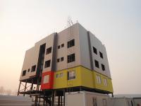 China Q355 Q235 Steel Structure Commercial Building Prefab Business Building 45m Clear Span for sale