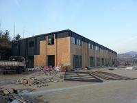 China Prefabricated Steel Frame Commercial Building with Insulated Sandwich Panel 50mm 100mm for sale