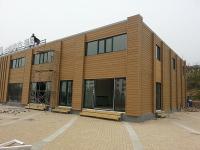China Prefabricated Steel Frame Commercial Building with Insulated Sandwich Panel 50mm 100mm for sale