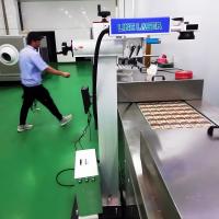 China 40W CO2 RF Flying Laser Marking Machine for PET Bottles with Conveyor for sale