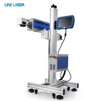 China 40W CO2 RF Flying Laser Marking Machine for PET Bottles with Conveyor for sale