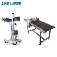 China 40W CO2 RF Flying Laser Marking Machine for PET Bottles with Conveyor for sale