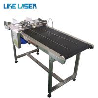 China 40W CO2 RF Flying Laser Marking Machine for PET Bottles with Conveyor for sale