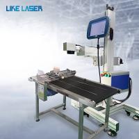 China Fiber Laser Marking Machine 20W 50W High Speed Flying Laser Engraver for Metal Pen with Conveyor Belt for sale